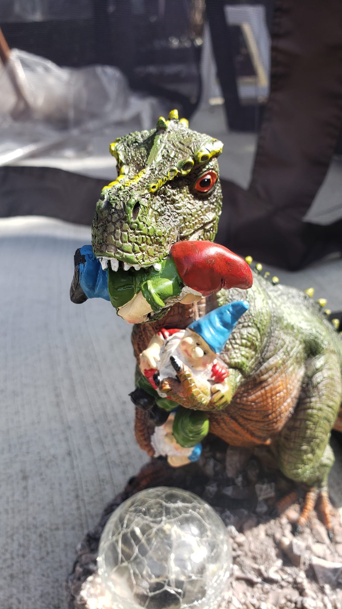 Dinosaur Eating Gnome with Light - The Gnome Shop